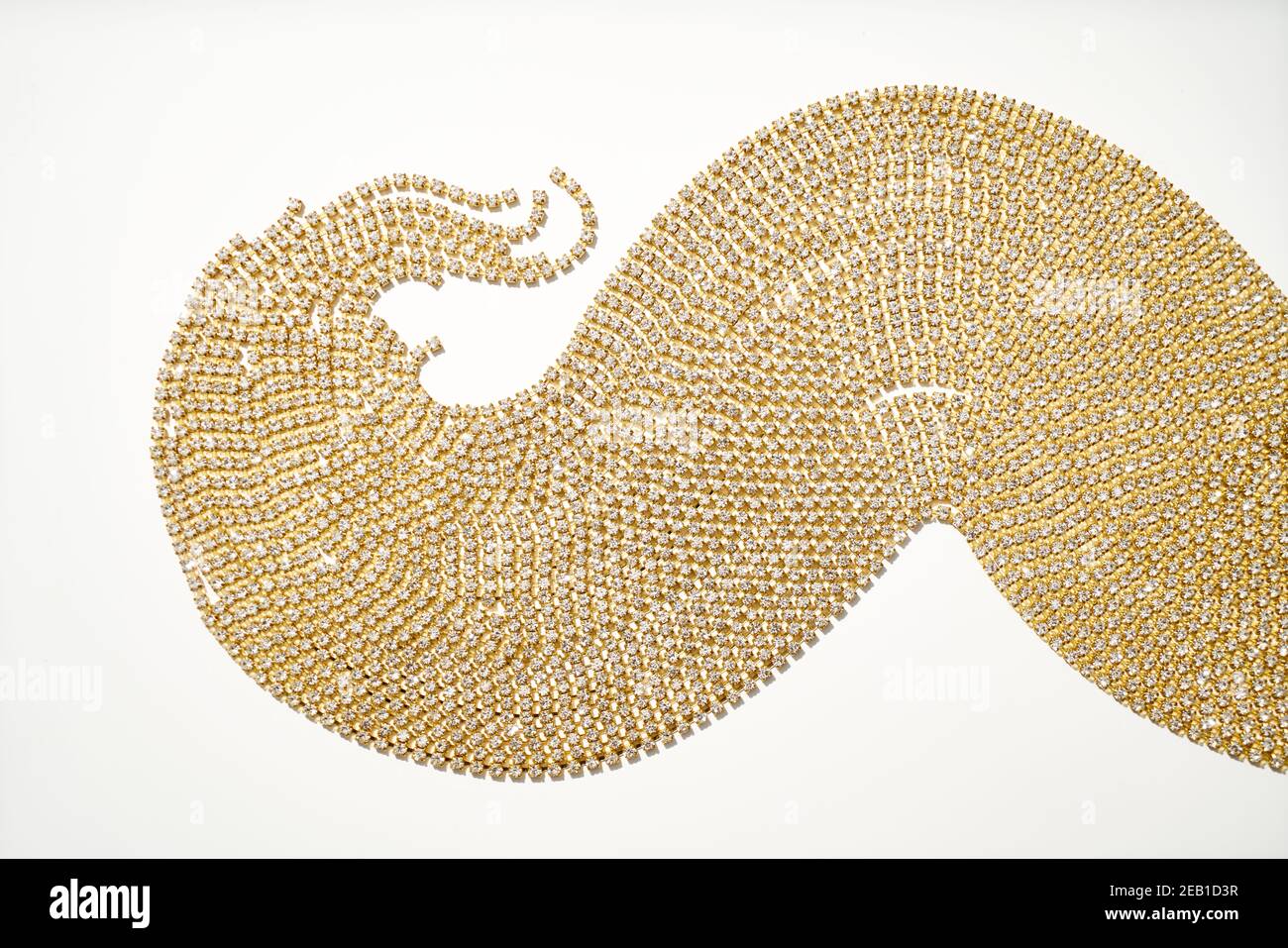 Strass strands on a white background, beautifully laid out in waves ...