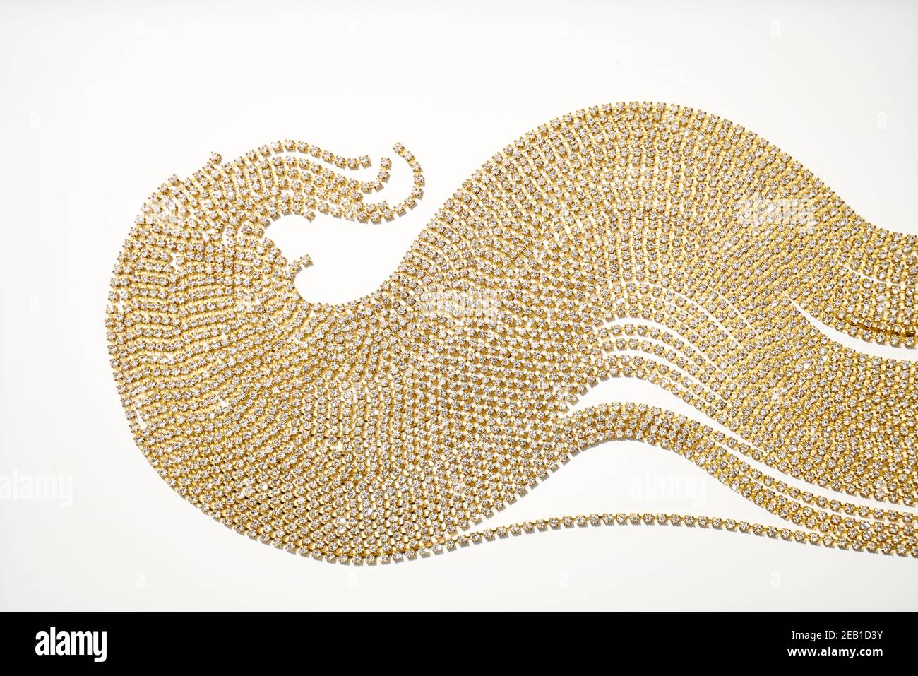 Strass strands on a white background, beautifully laid out in waves ...