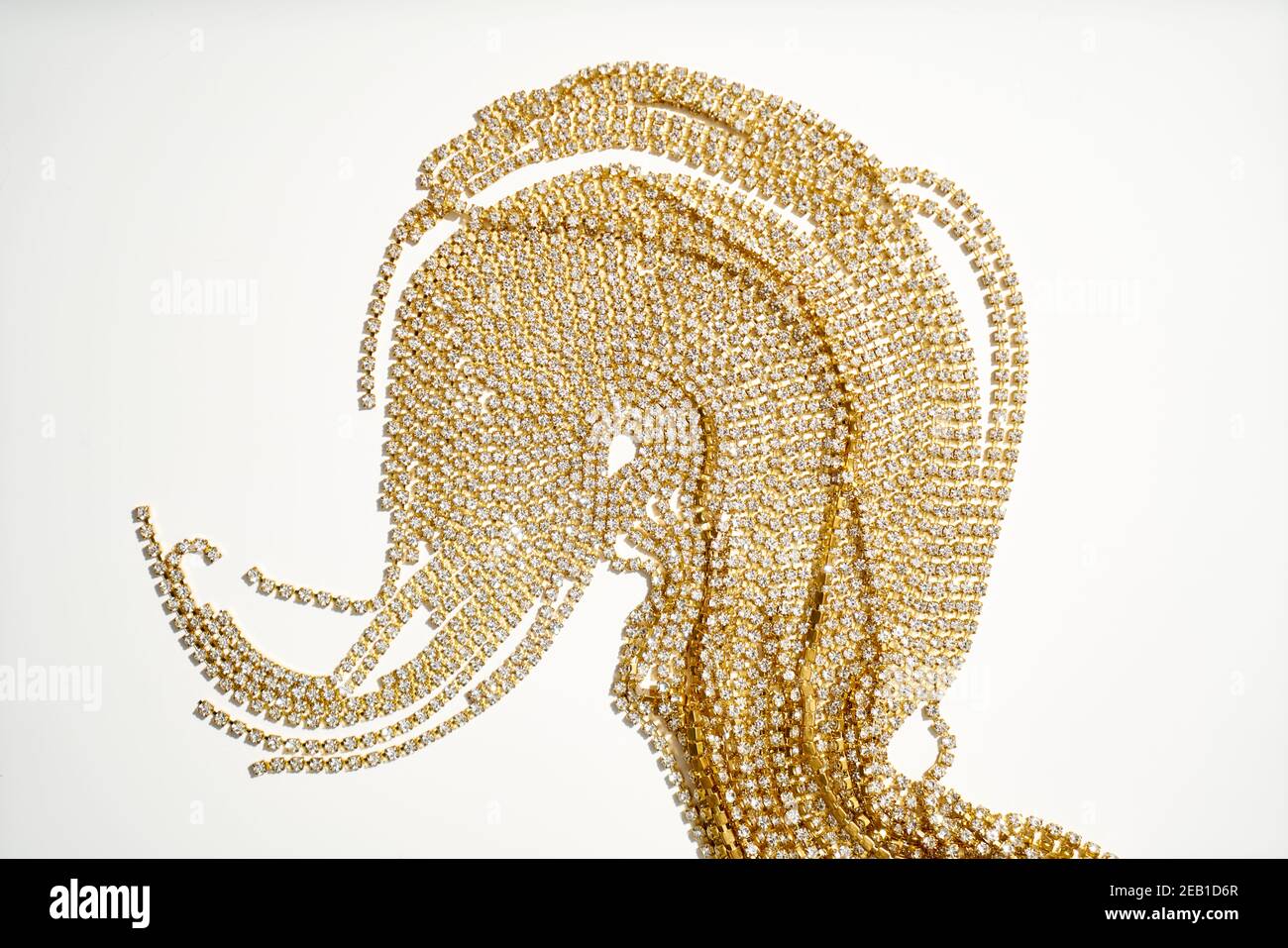 Strass strands on a white background, beautifully laid out in waves ...