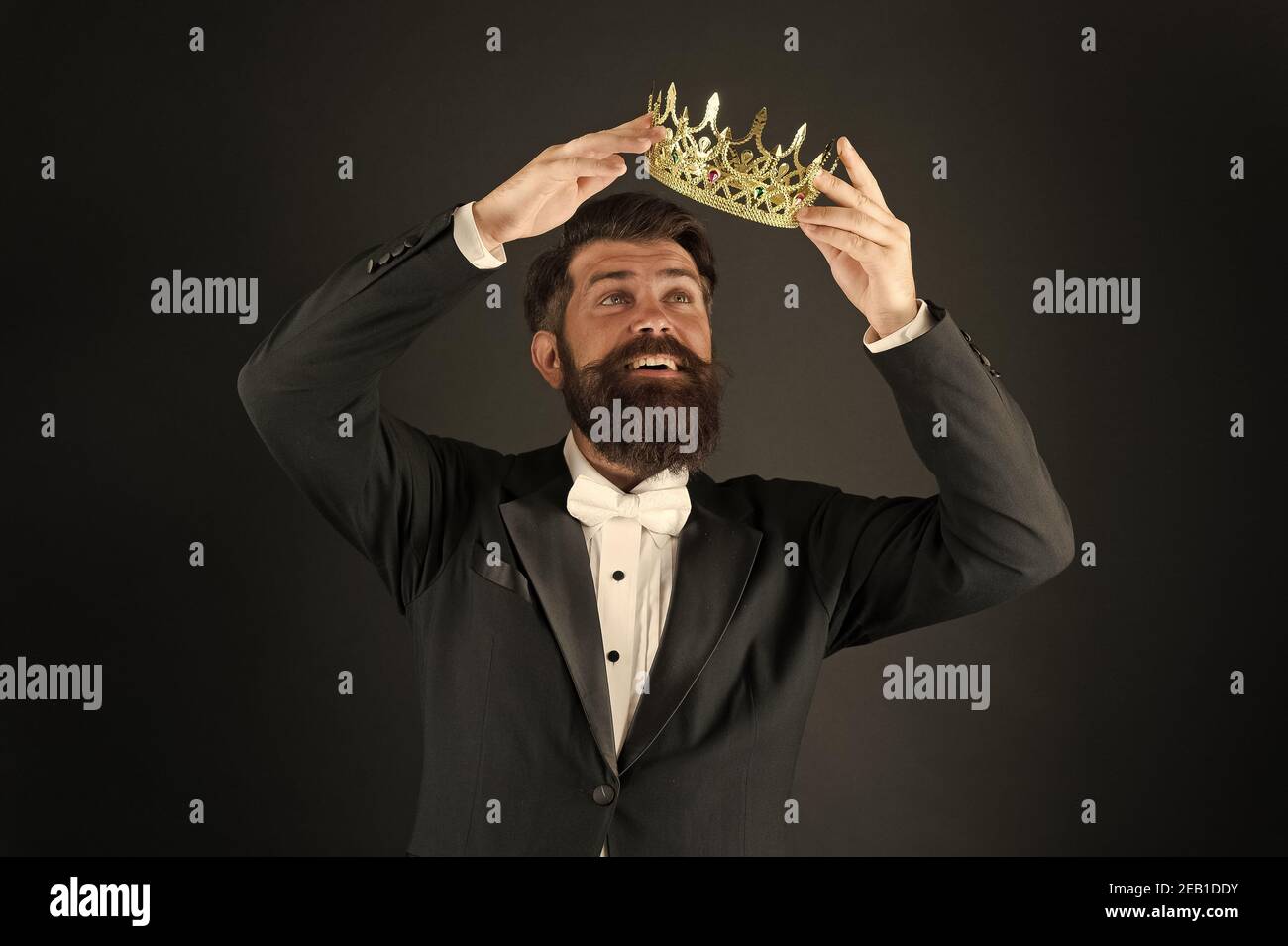 Responsibility being king. Handsome bearded smiling guy king. King ...