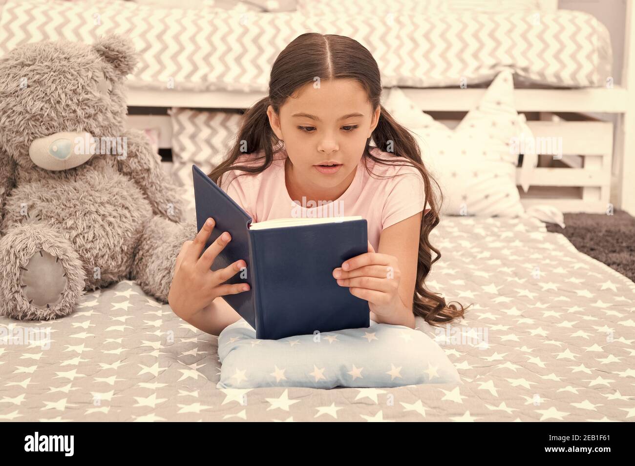 Little child read English book. Small girl learn English. English ...