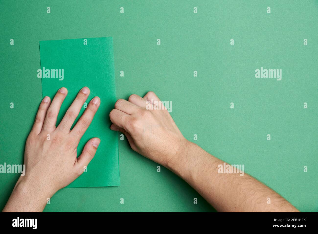 Woman folding paper origami hi-res stock photography and images - Alamy