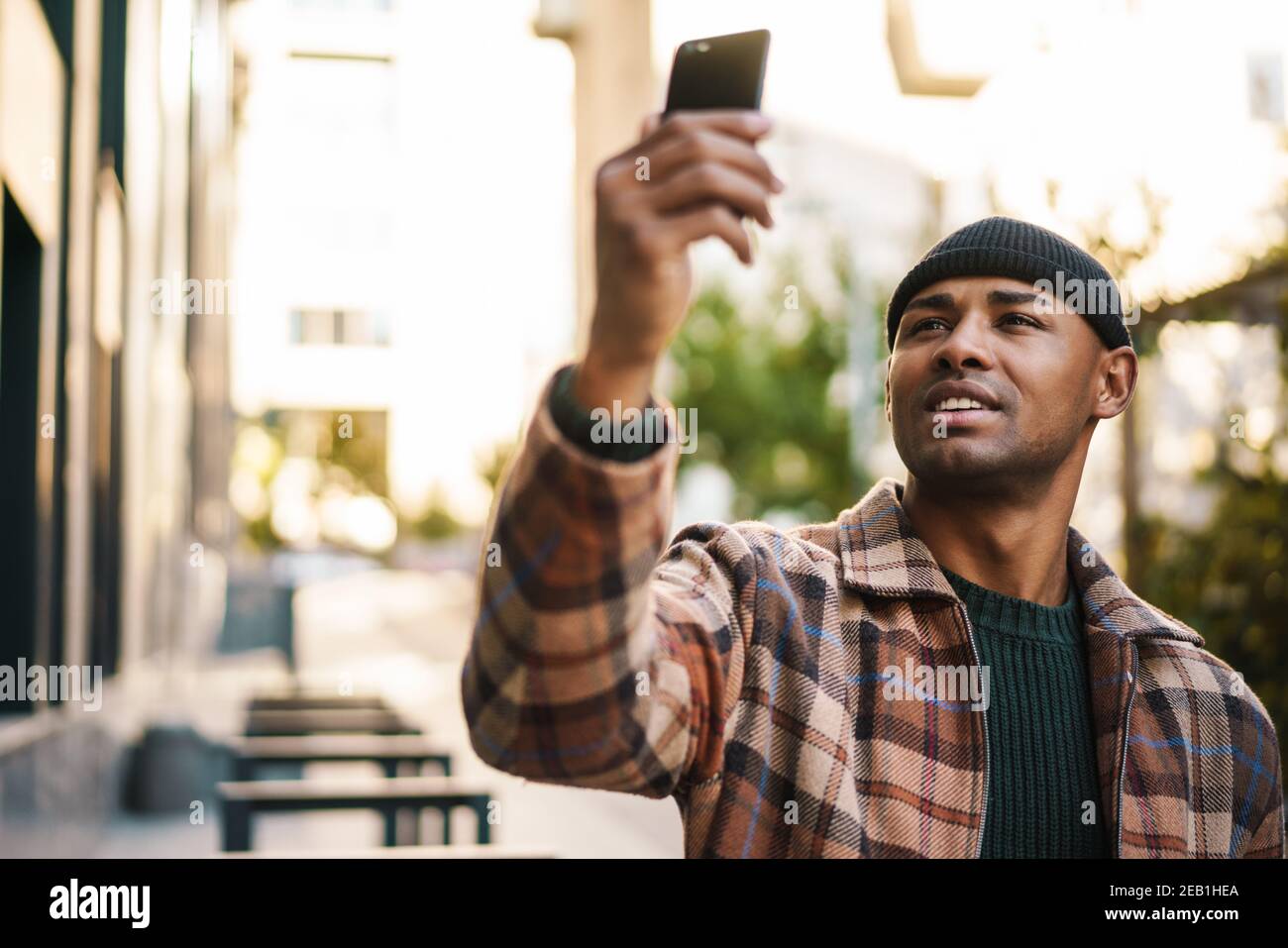 African man taking photos hi-res stock photography and images - Alamy