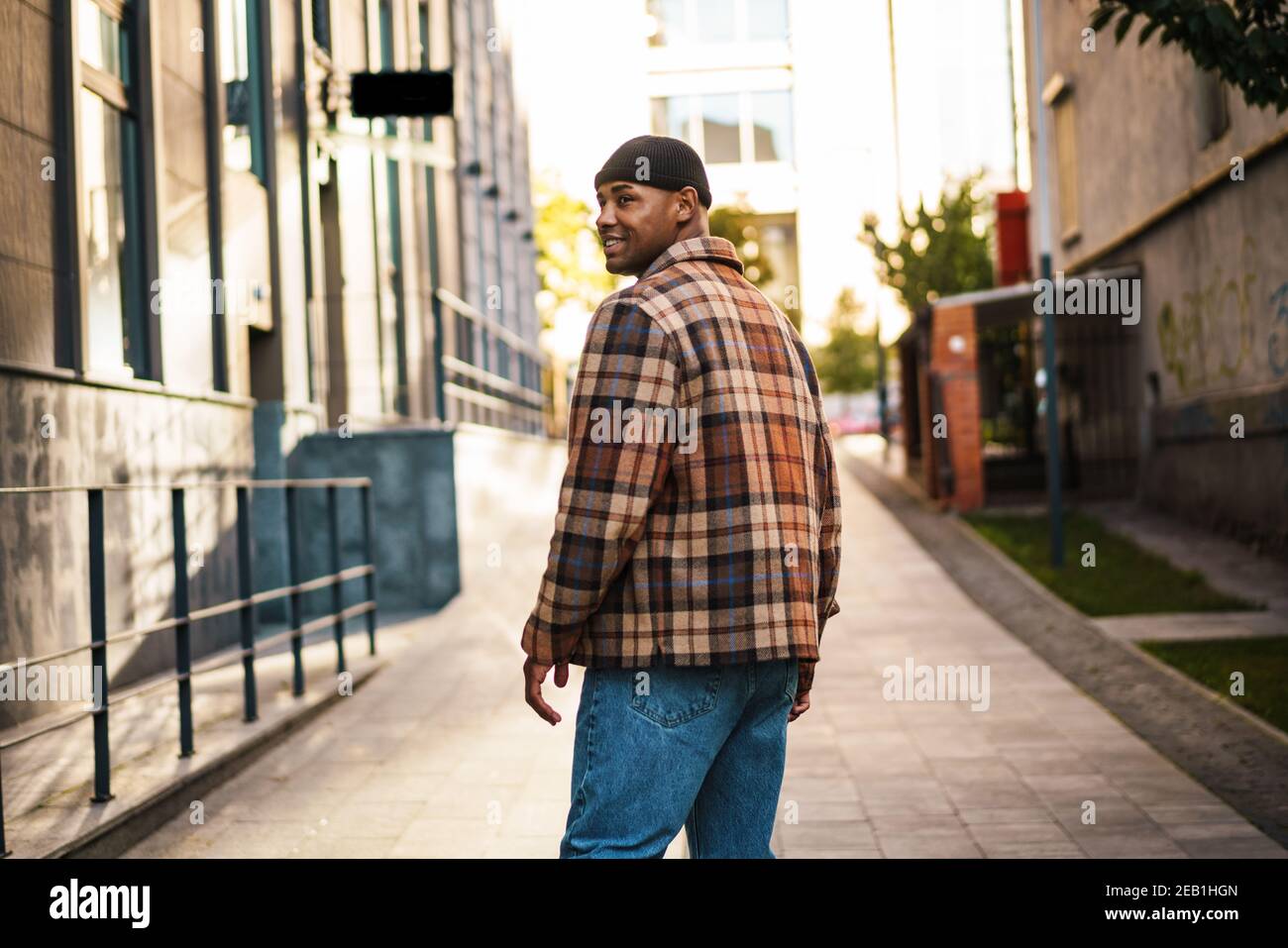 Back view stylish african hi-res stock photography and images - Alamy