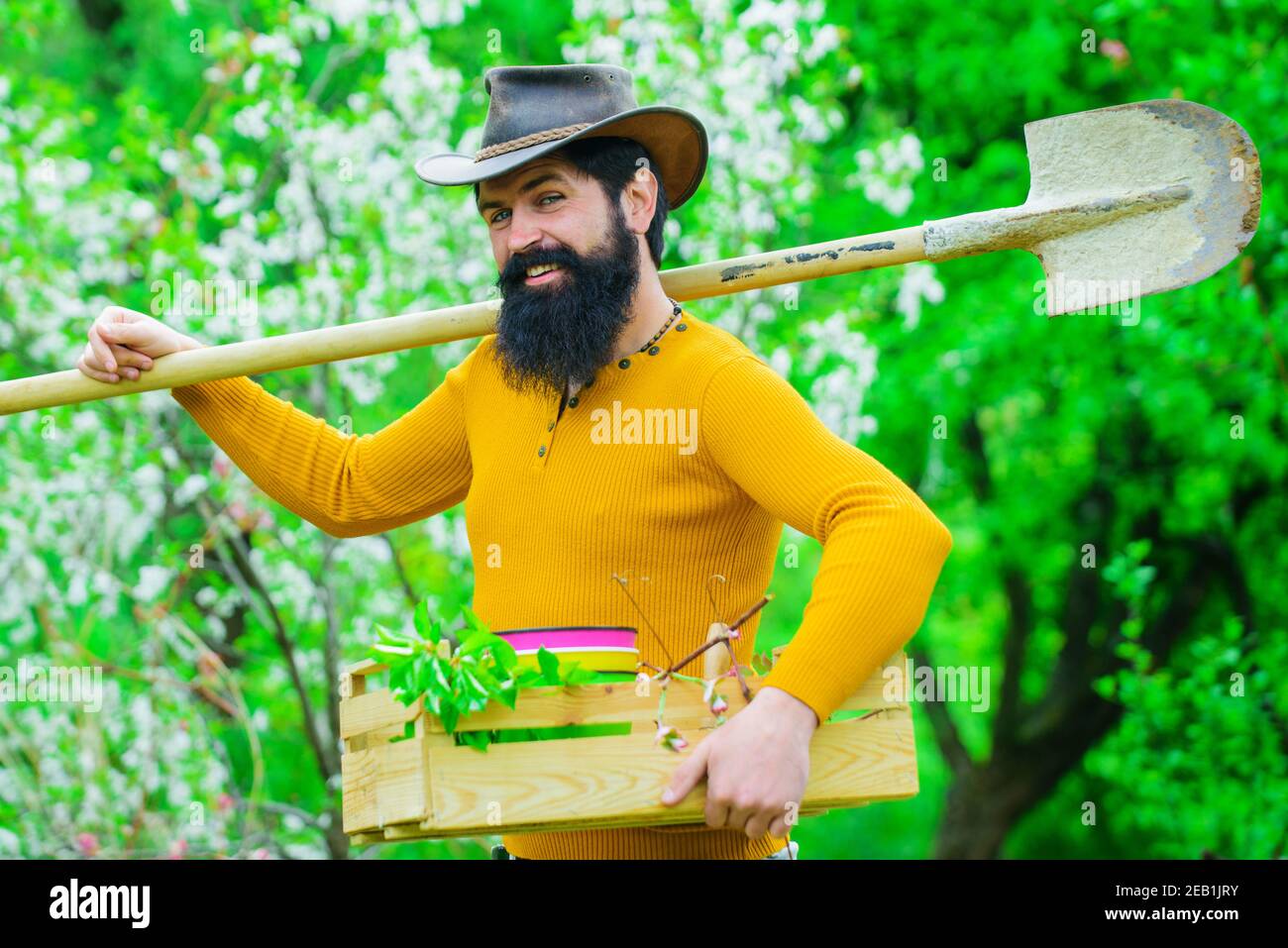 Farmer wooden man planting hi-res stock photography and images - Alamy