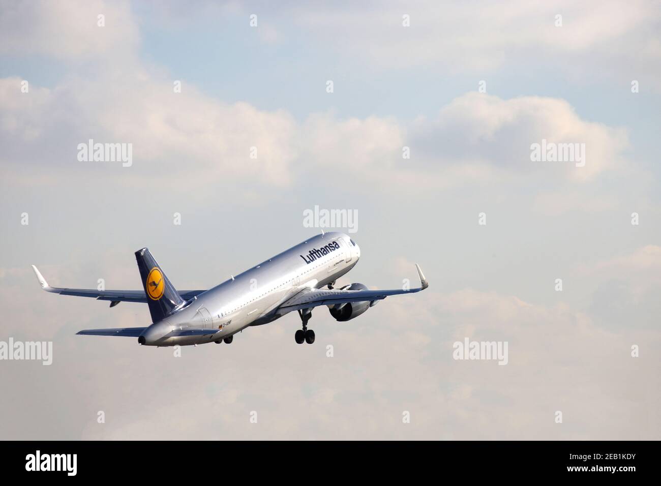 A passenger plane of the German airline "Lufthansa" takes off at ...