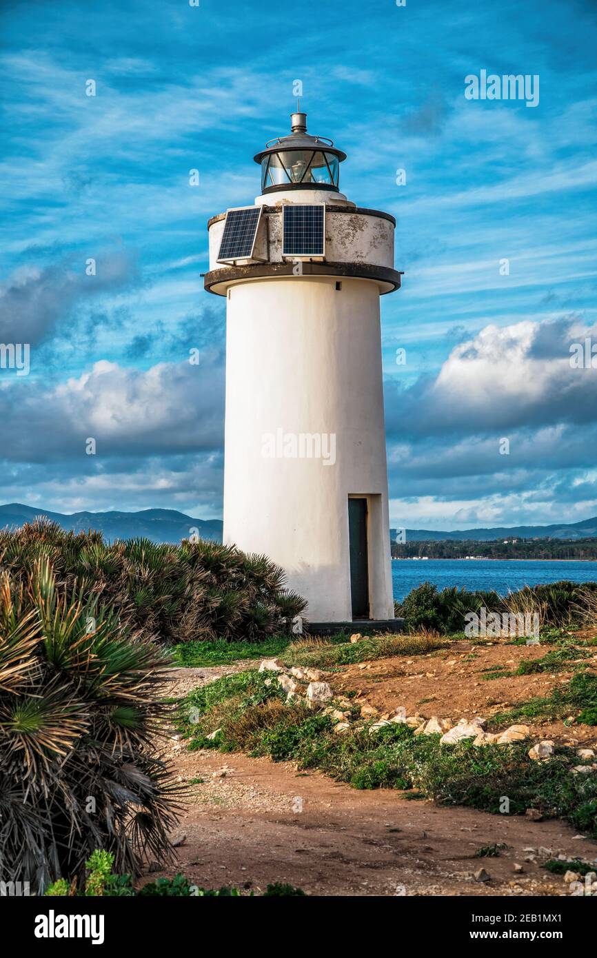 A beautiful solar powered lighthouse with a spectacular cloudy sky in ...