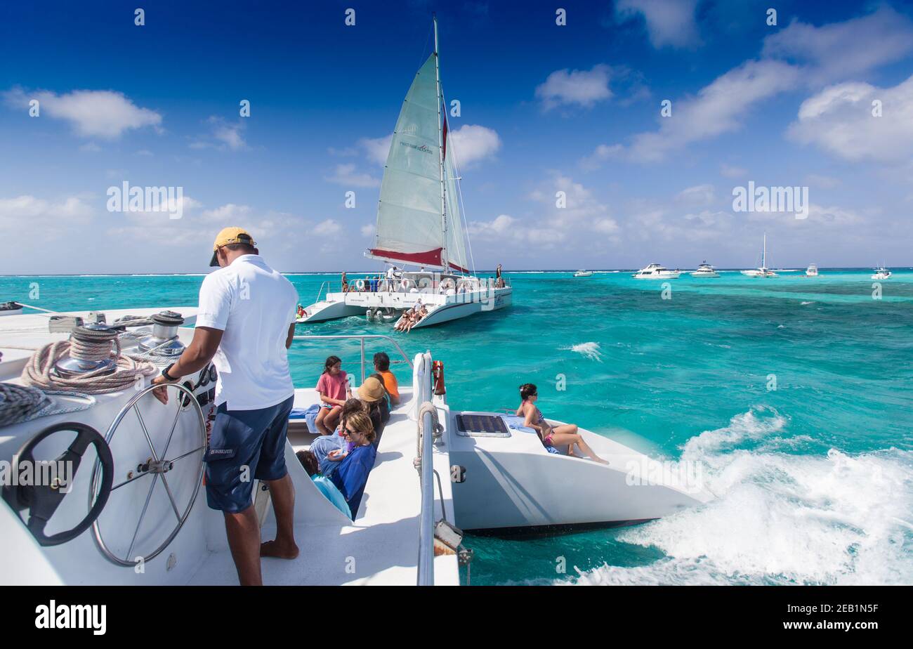 Tourist pictures with Stingray stock photo Stingray City, Sandbar ...