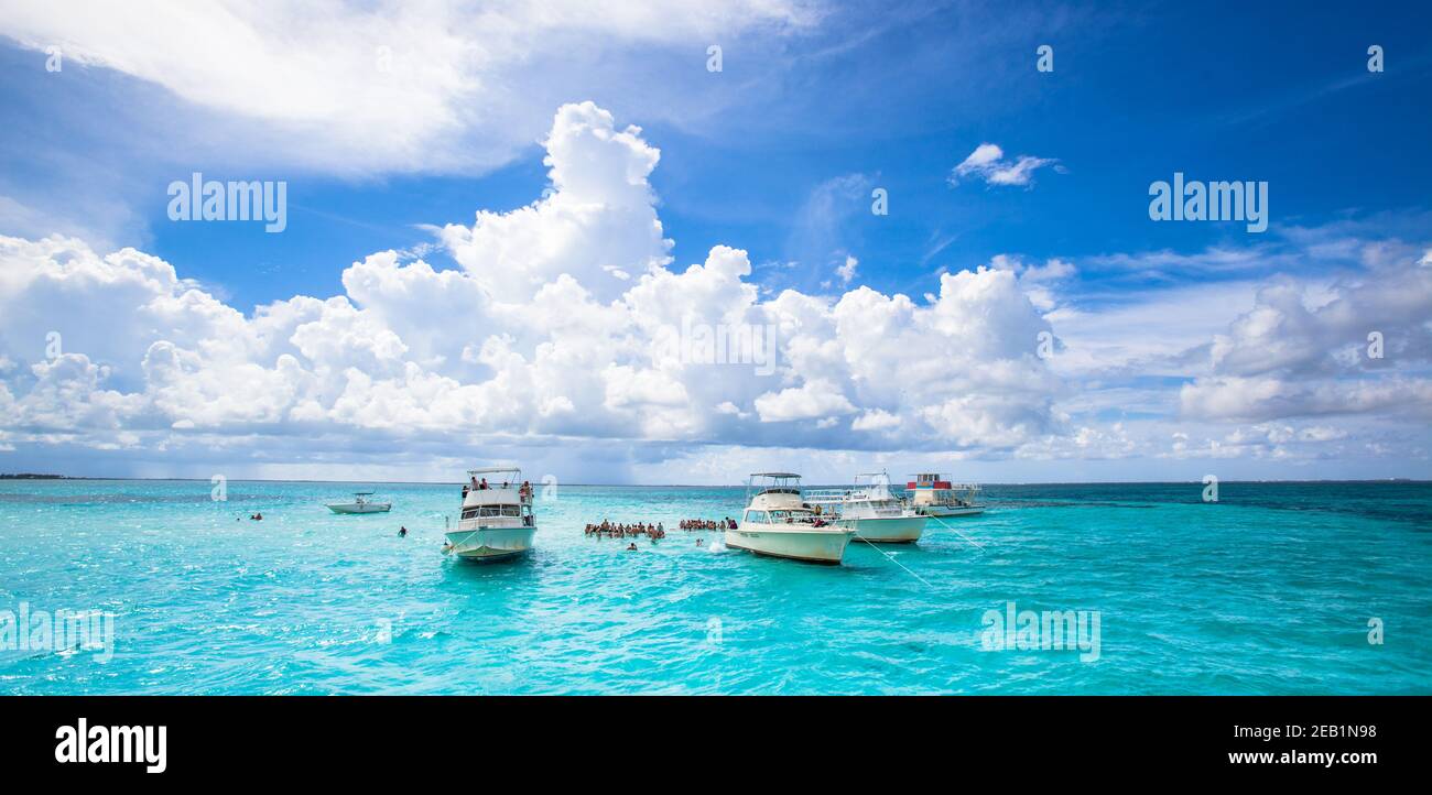 Tourist pictures with Stingray stock photo Stingray City, Sandbar ...