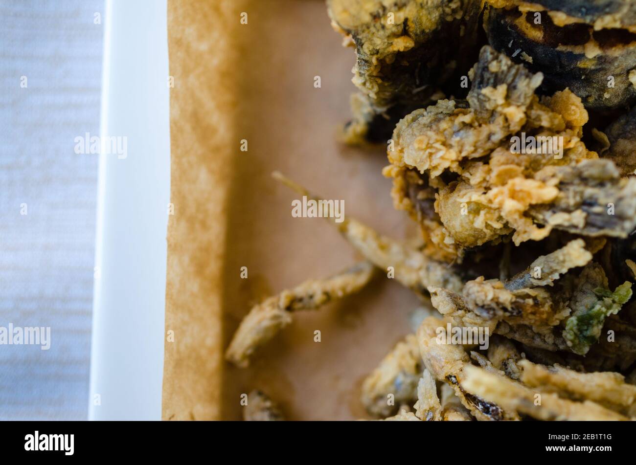 Battered deep fried river fish Stock Photo - Alamy