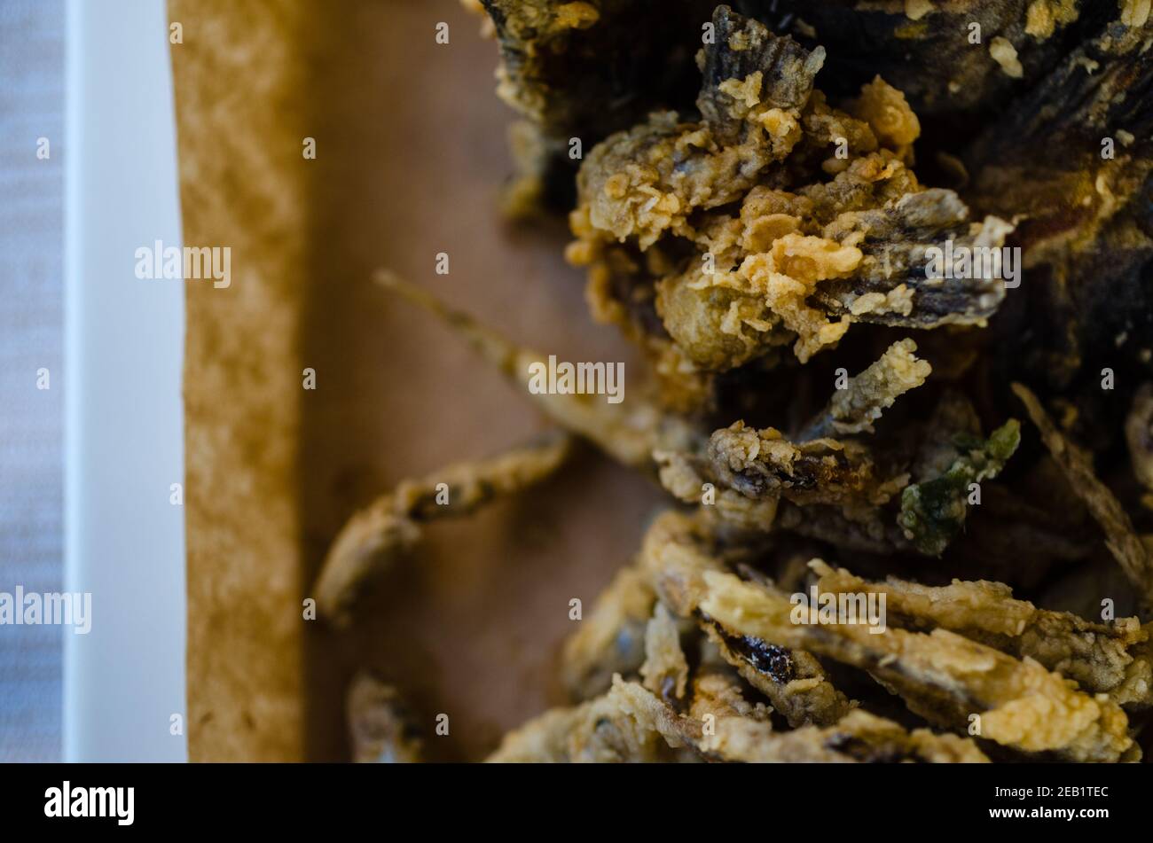 Battered deep fried river fish Stock Photo - Alamy