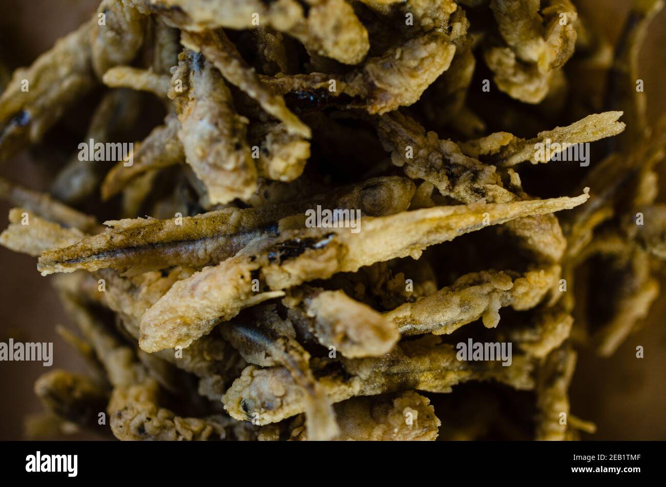 Battered deep fried river fish Stock Photo - Alamy