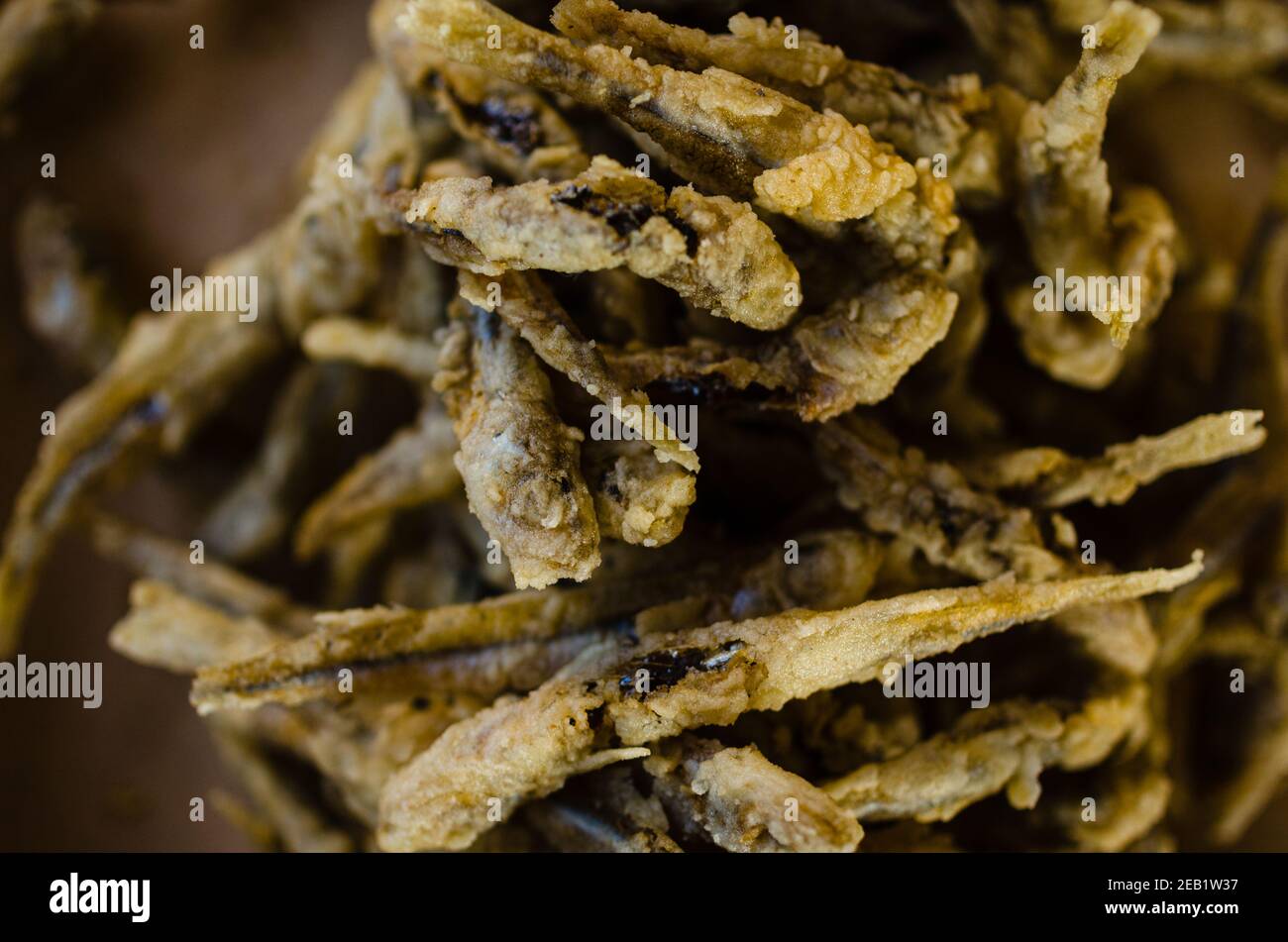 Battered deep fried river fish Stock Photo - Alamy
