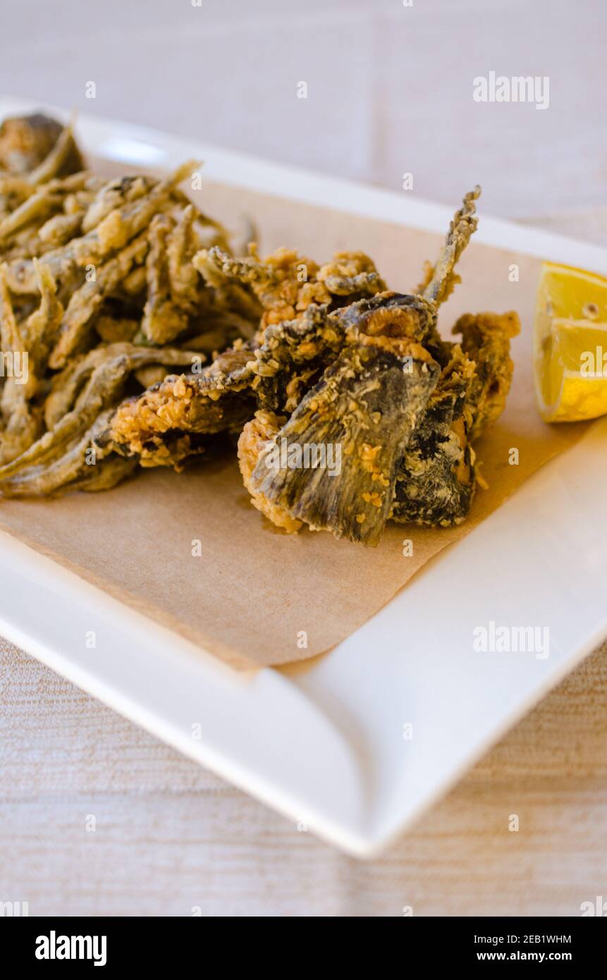 Battered deep fried river fish Stock Photo - Alamy