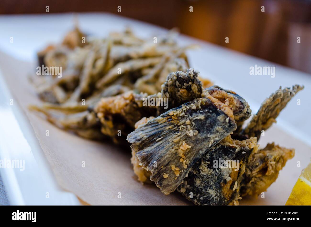 Battered deep fried river fish Stock Photo - Alamy