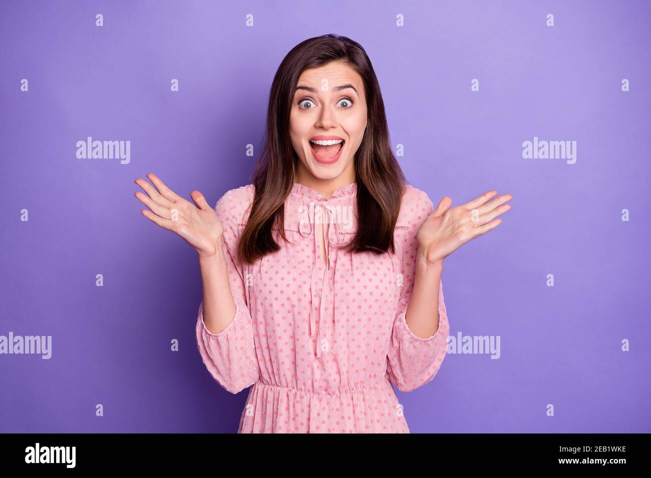 Photo of delighted funny lady arms palms up open mouth wear retro ...
