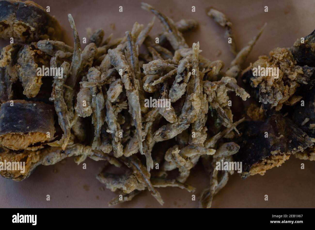 Battered deep fried river fish Stock Photo - Alamy