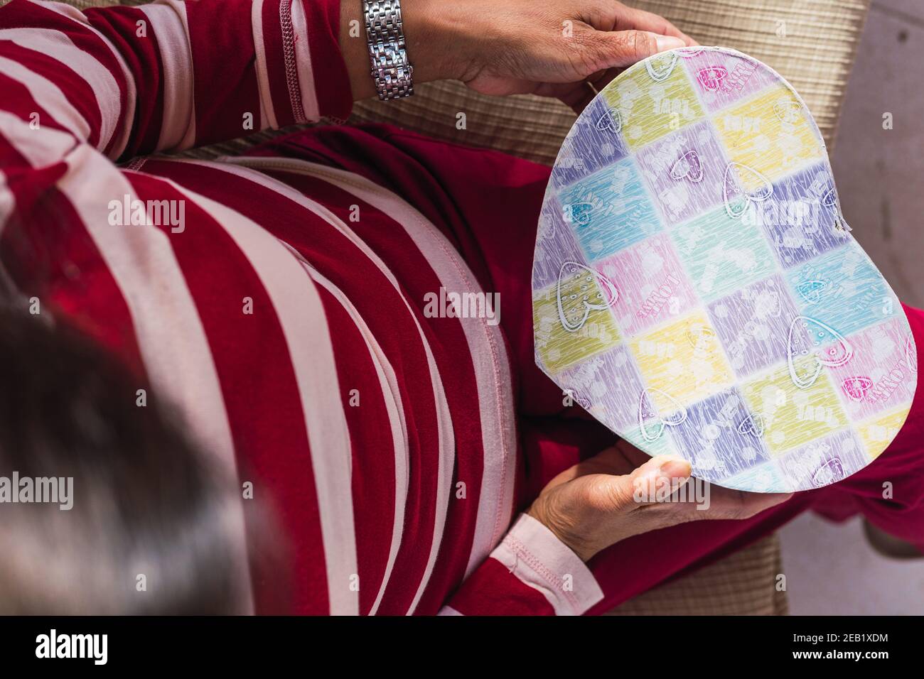 Unrecognizable women with a Valentine's Day present Stock Photo - Alamy