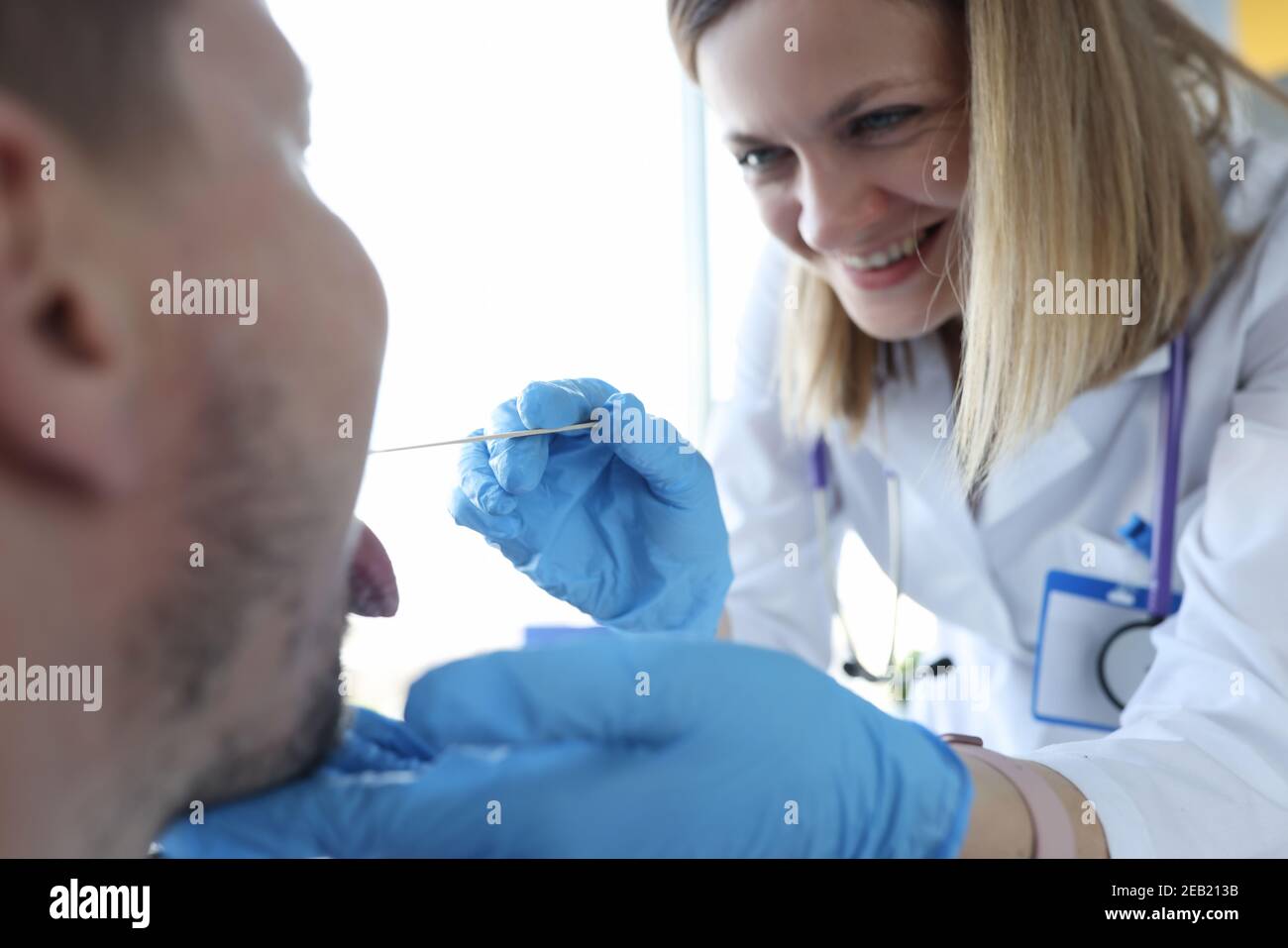 Throat examination hi-res stock photography and images - Alamy