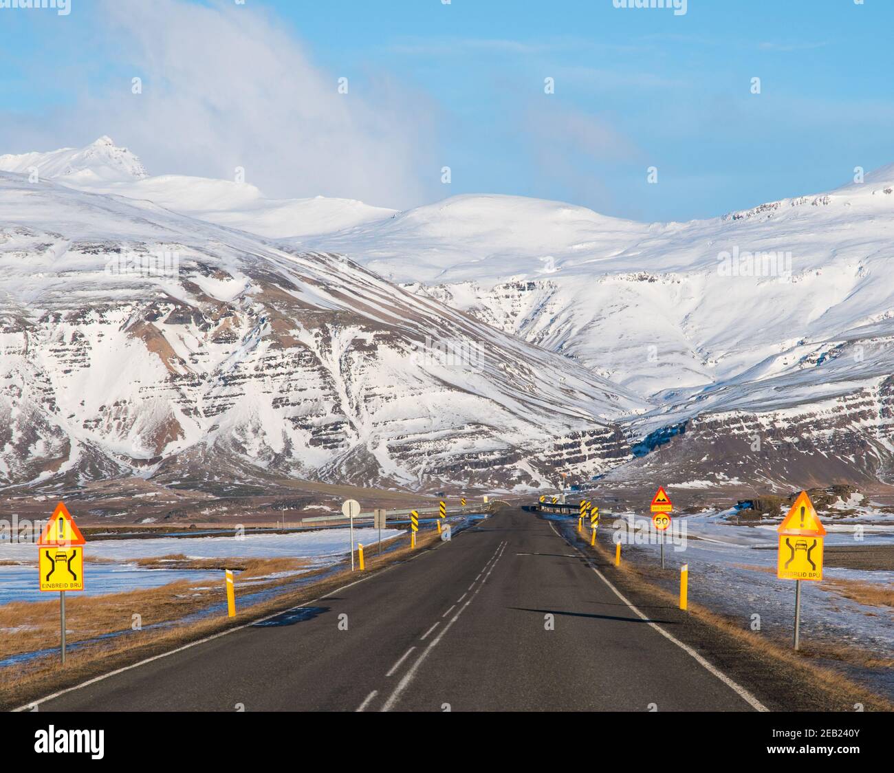 Warning signs on the way to a single line bridge on the Icelandic ...