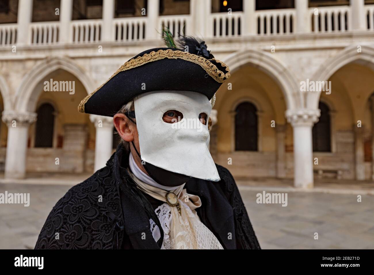 Traditional Bauta costume with cape, feathered tricornered hat and ...