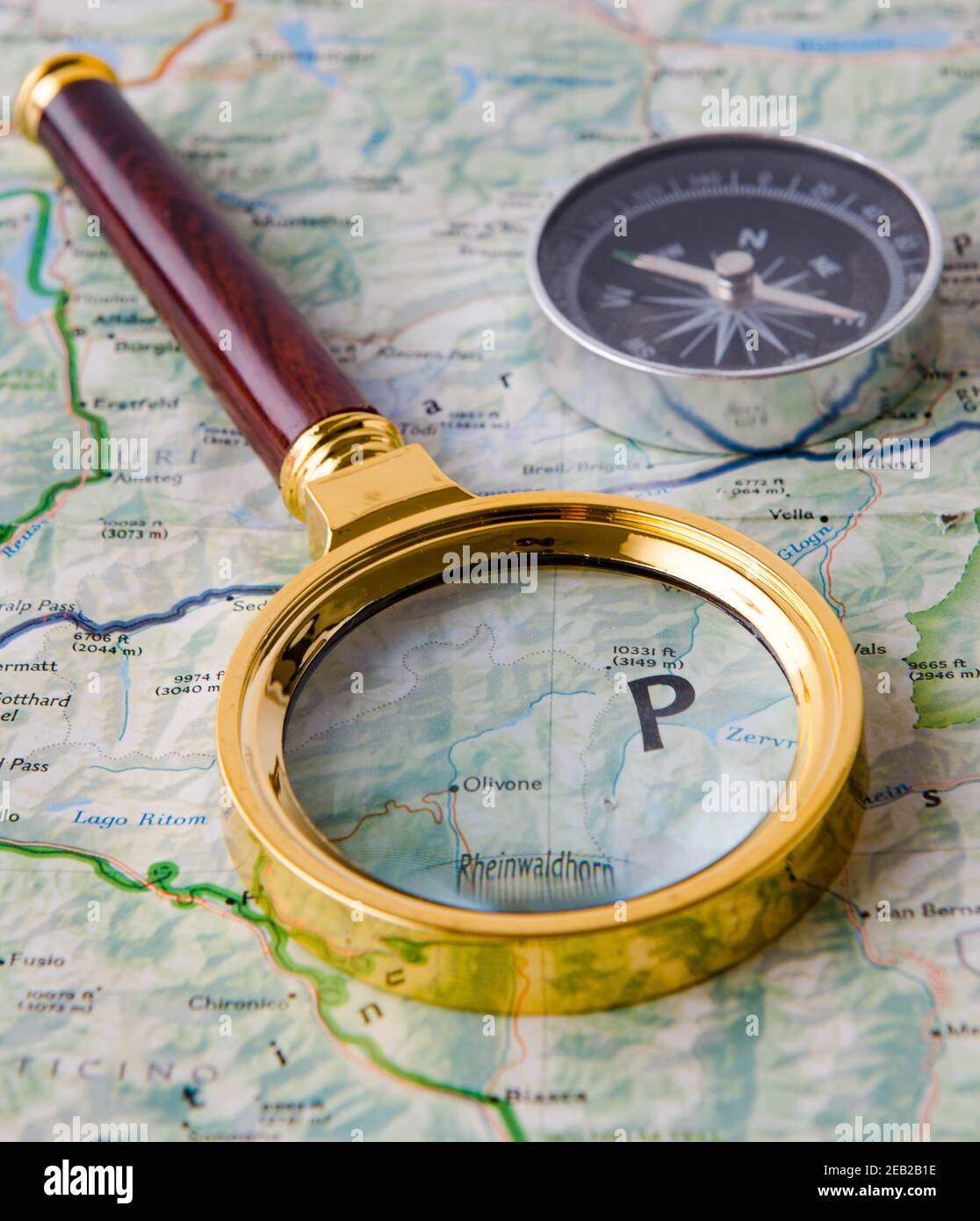 The travel concept with compass and map Stock Photo - Alamy