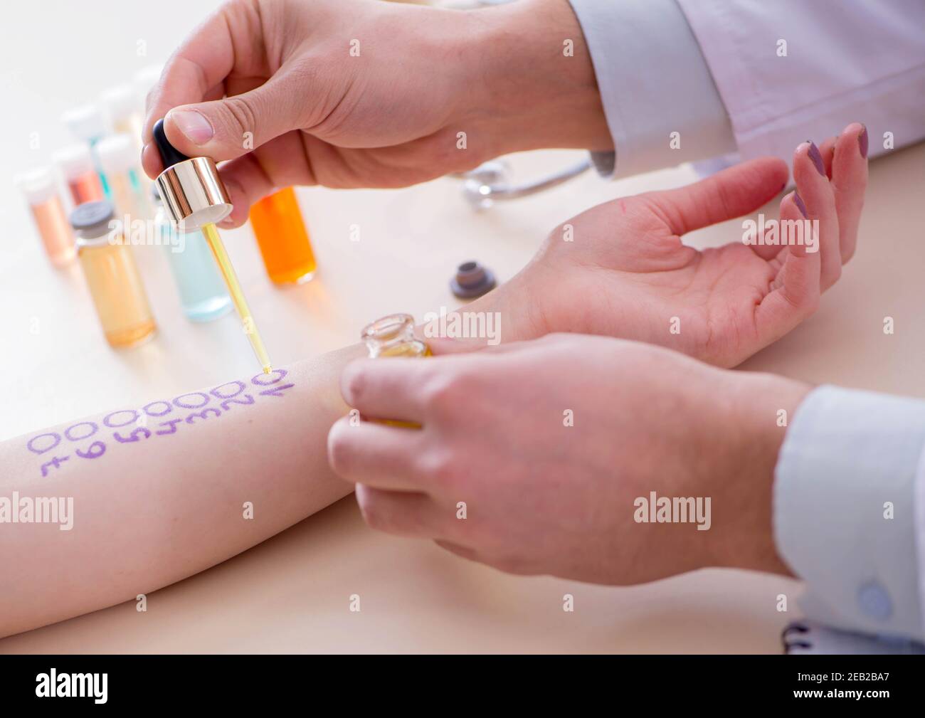 The doctor testing allergy reaction of patient in hospital Stock Photo ...