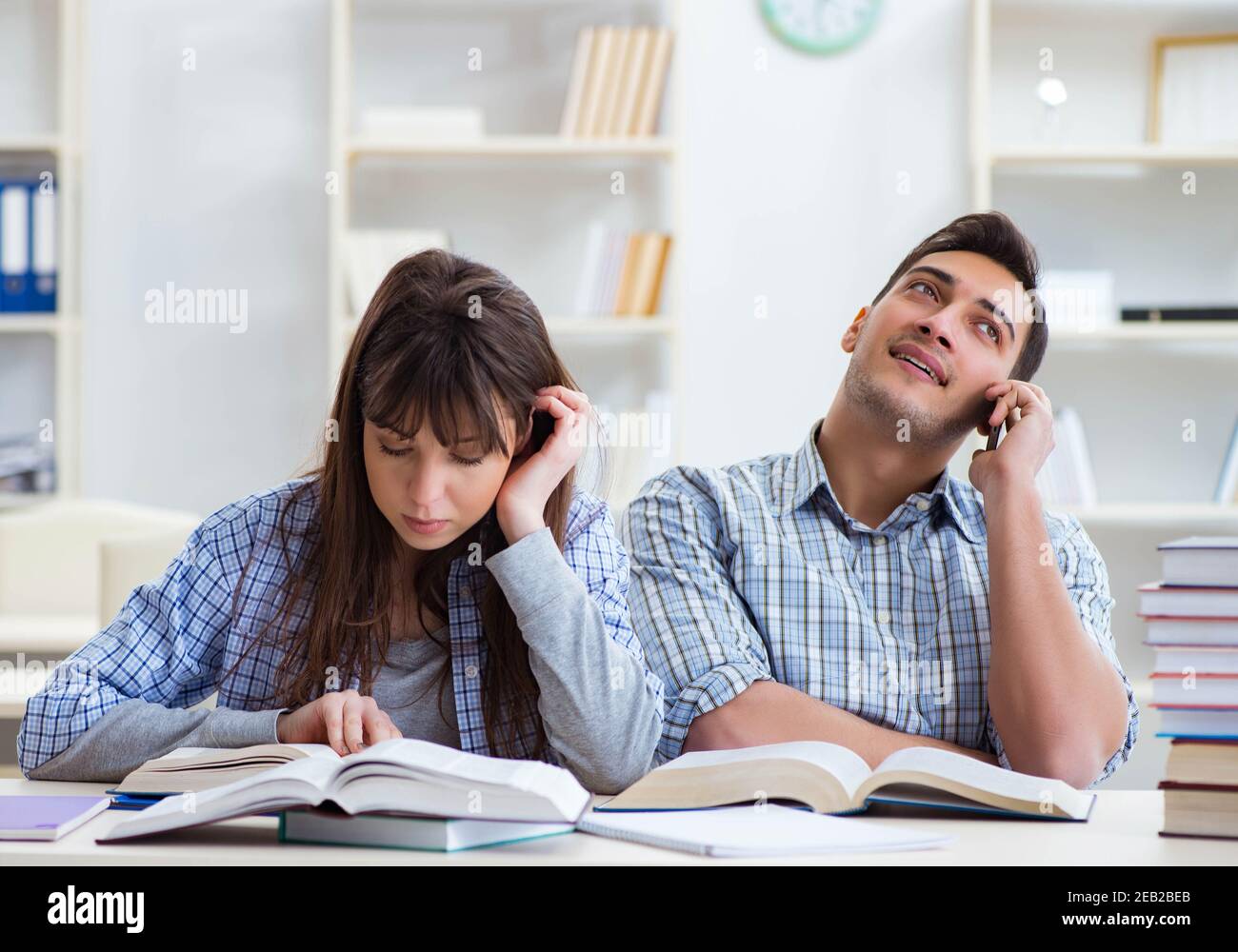 The students sitting and studying in classroom college Stock Photo - Alamy