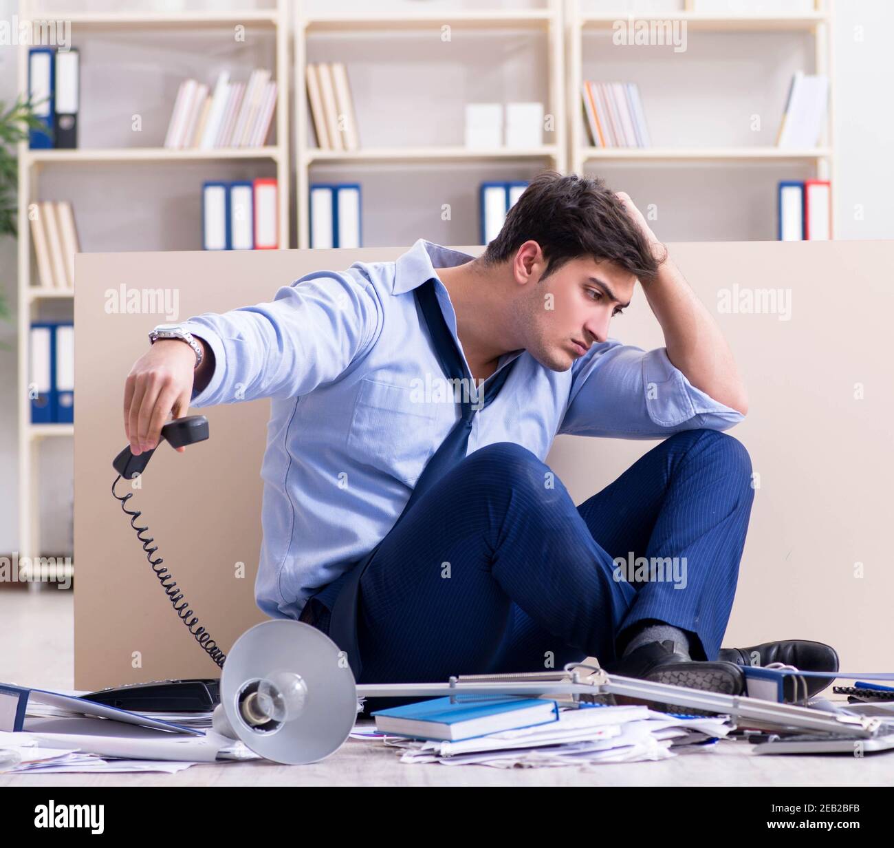 The businessman frustrated at many telephone calls Stock Photo - Alamy