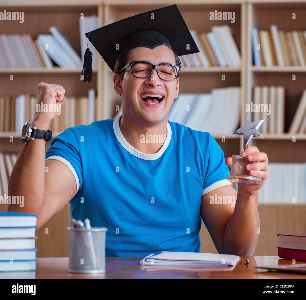 The young man graduating from university Stock Photo - Alamy