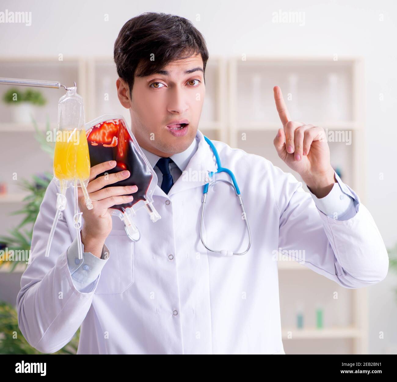 The doctor with bag of blood plasma in hospital Stock Photo - Alamy