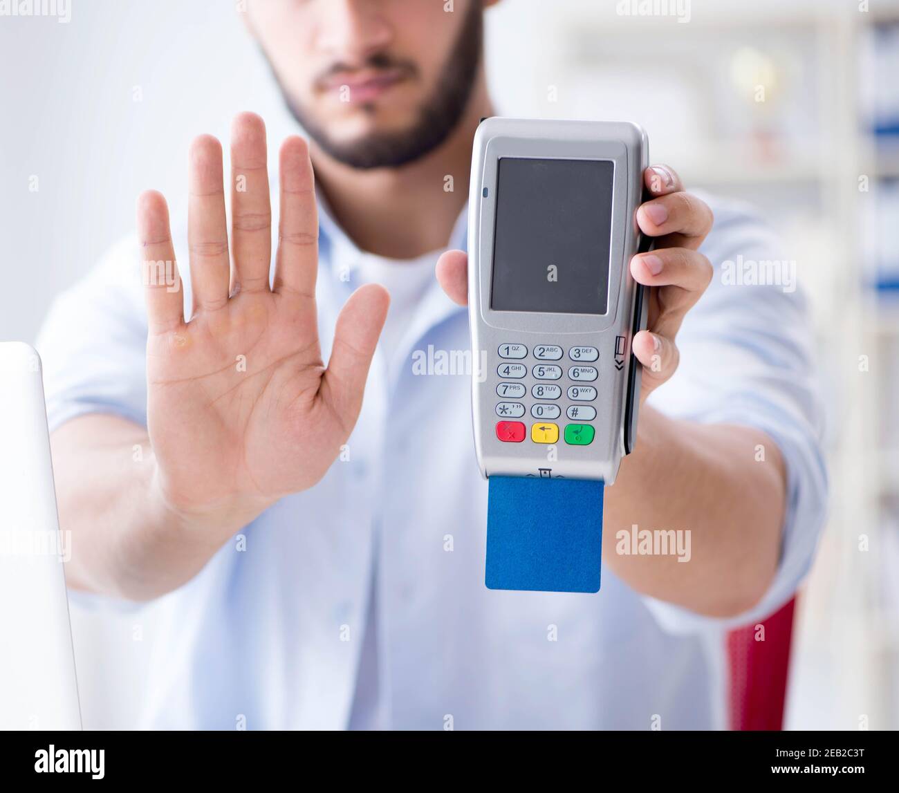 The man processing credit card transaction with pos terminal Stock ...