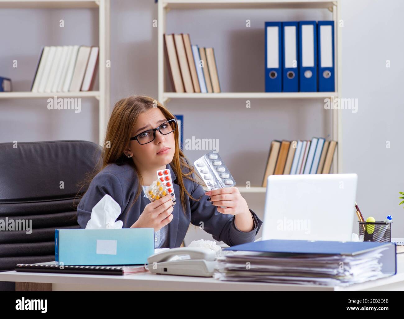 The businesswoman employee sick in the office Stock Photo - Alamy
