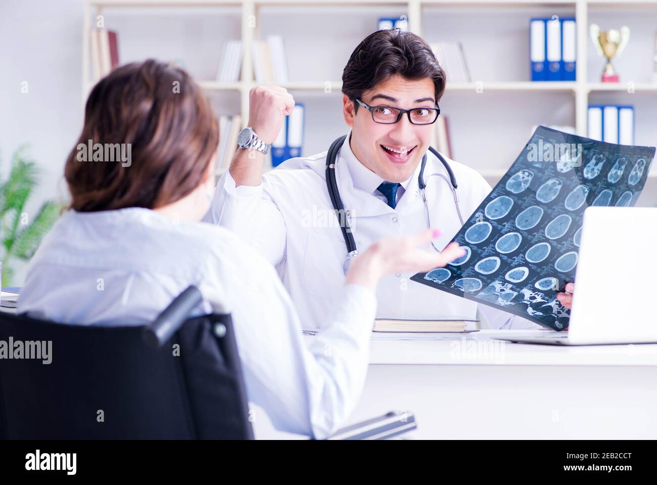 The doctor explaining to patient results of x-ray imaging Stock Photo ...