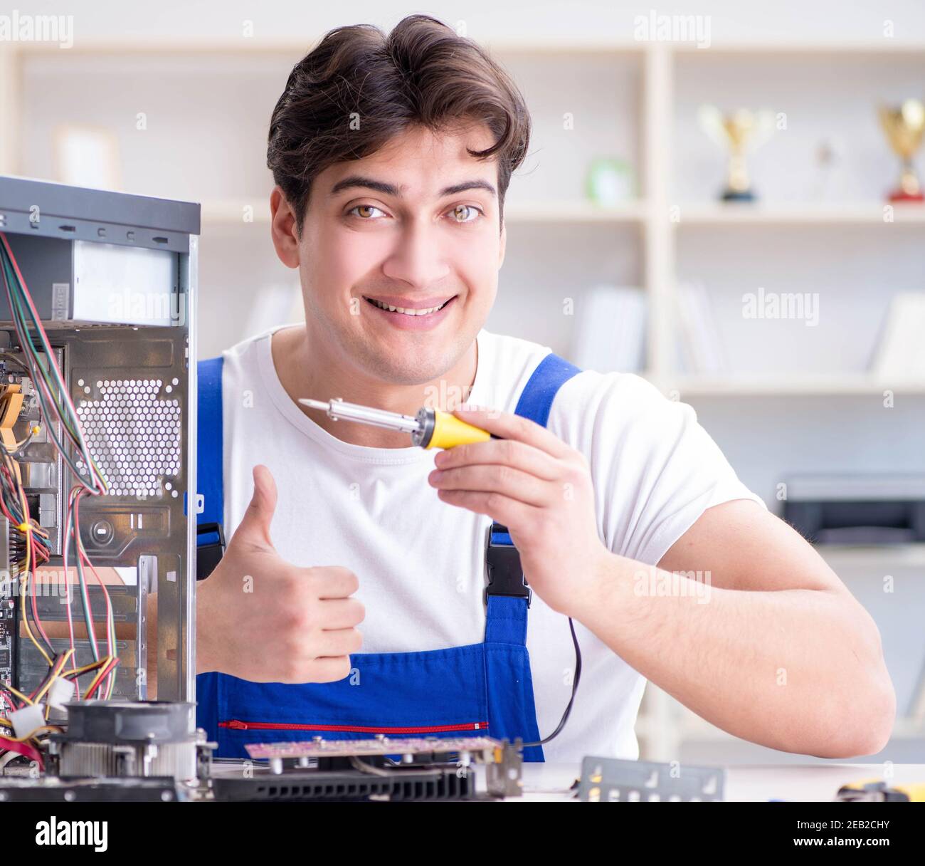 Computer hardware repair and fixing concept by experienced technician ...