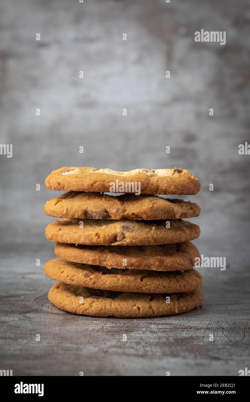 Cookies stacked with a neutral colored background Stock Photo - Alamy