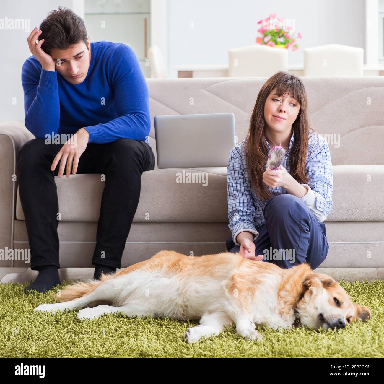 The man having allergy from dog fur Stock Photo - Alamy