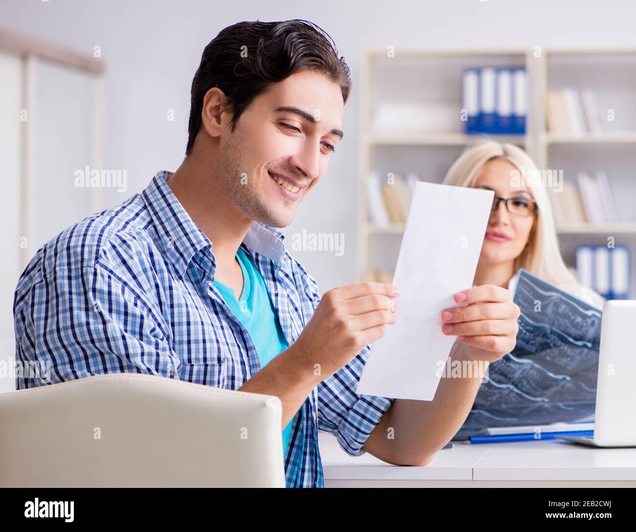 The male patient angry at expensive healthcare bill Stock Photo - Alamy