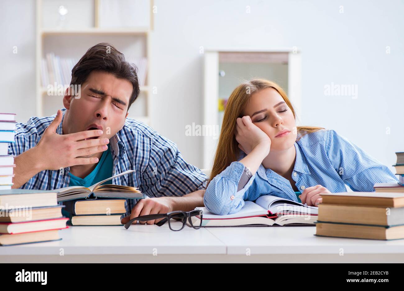 The pair of students studying for university exams Stock Photo - Alamy