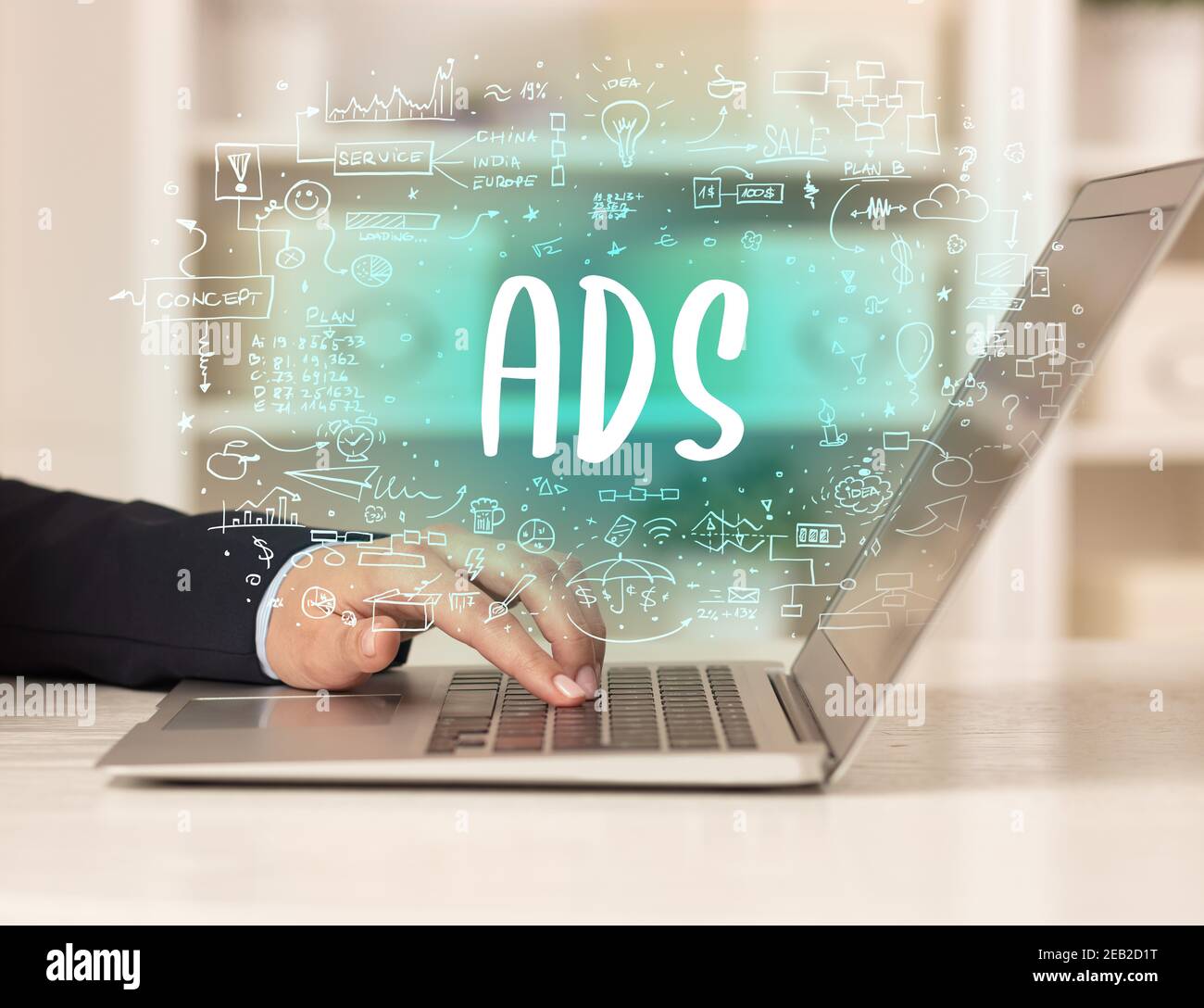 hand working on new modern computer with ADS abbreviation, modern ...