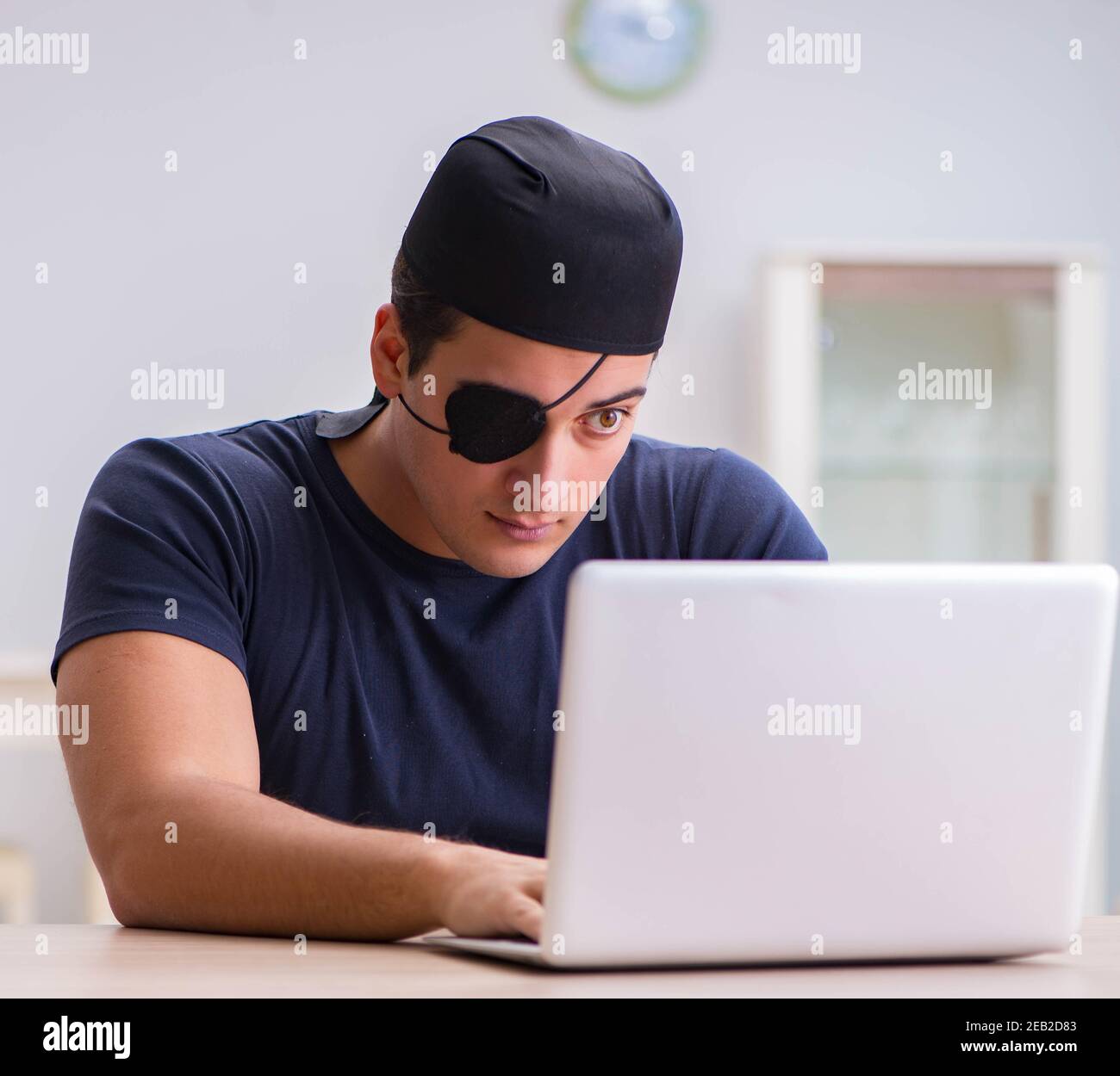 The digital security concept with pirate at computer Stock Photo - Alamy
