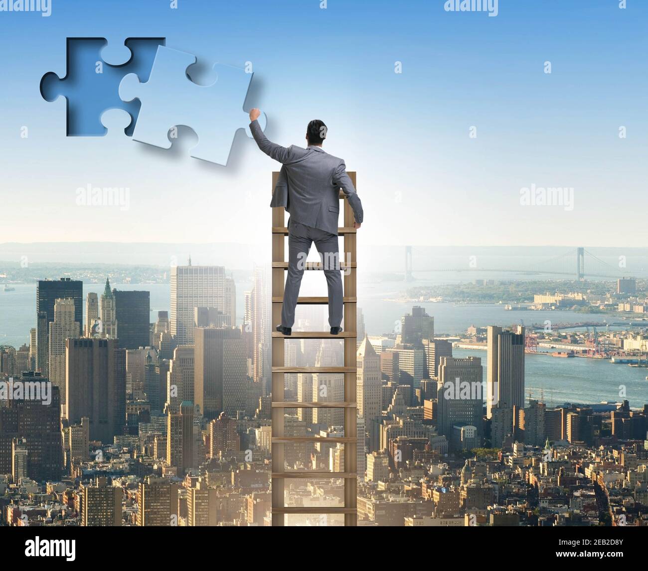 The businessman putting together jigsaw puzzle pieces Stock Photo - Alamy