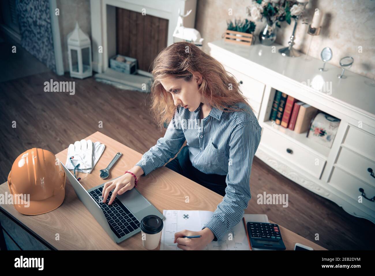 Engineer or Architect Worker Woman is Working at Home Workplace ...