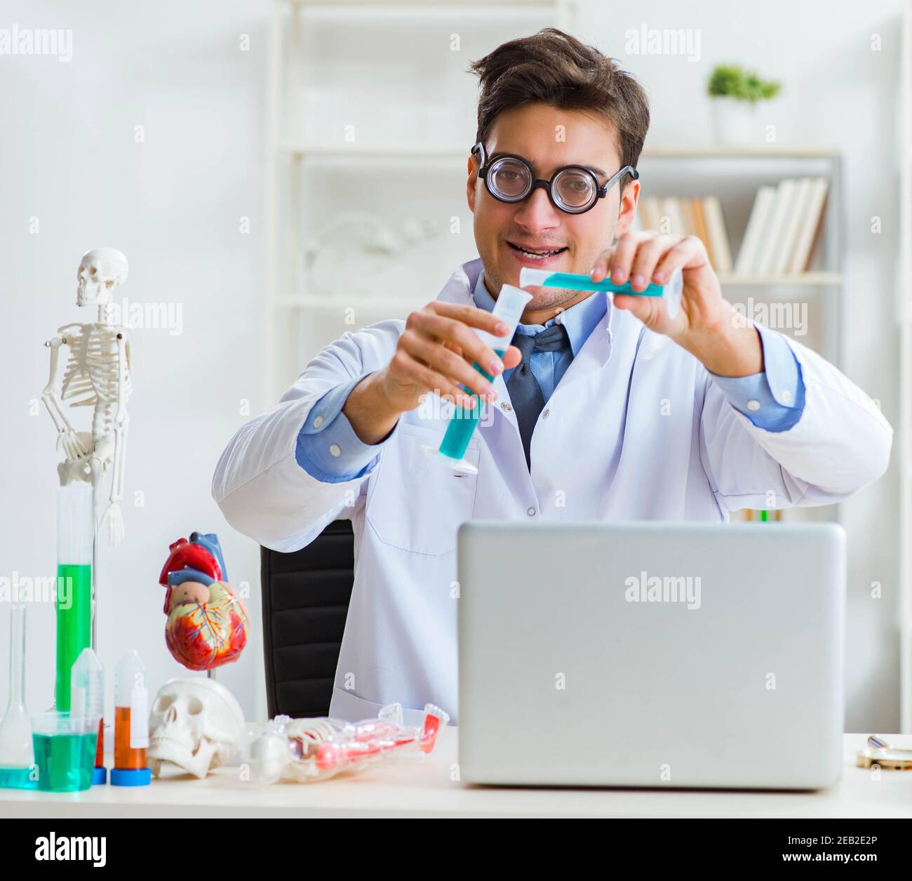 The funny doctor having fun in hospital lab Stock Photo - Alamy