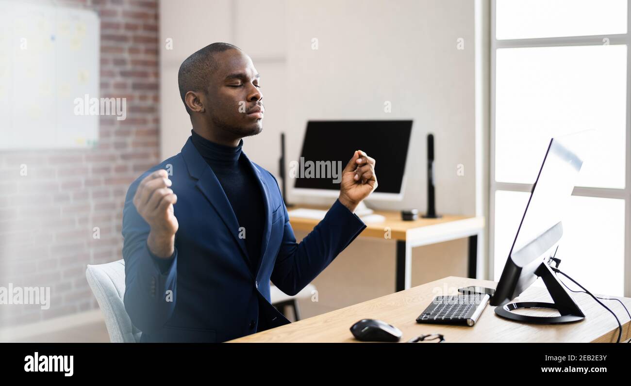 Healthy Yoga Meditation In Office Chair At Workplace Stock Photo - Alamy
