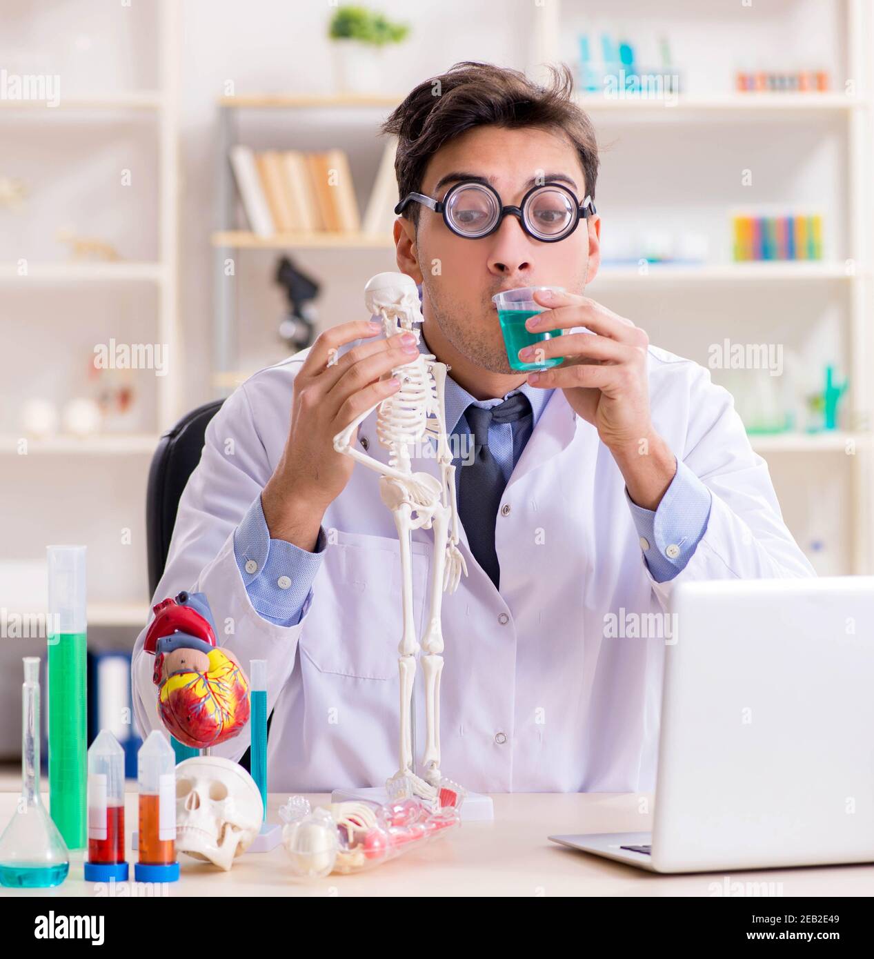 The funny doctor having fun in hospital lab Stock Photo - Alamy