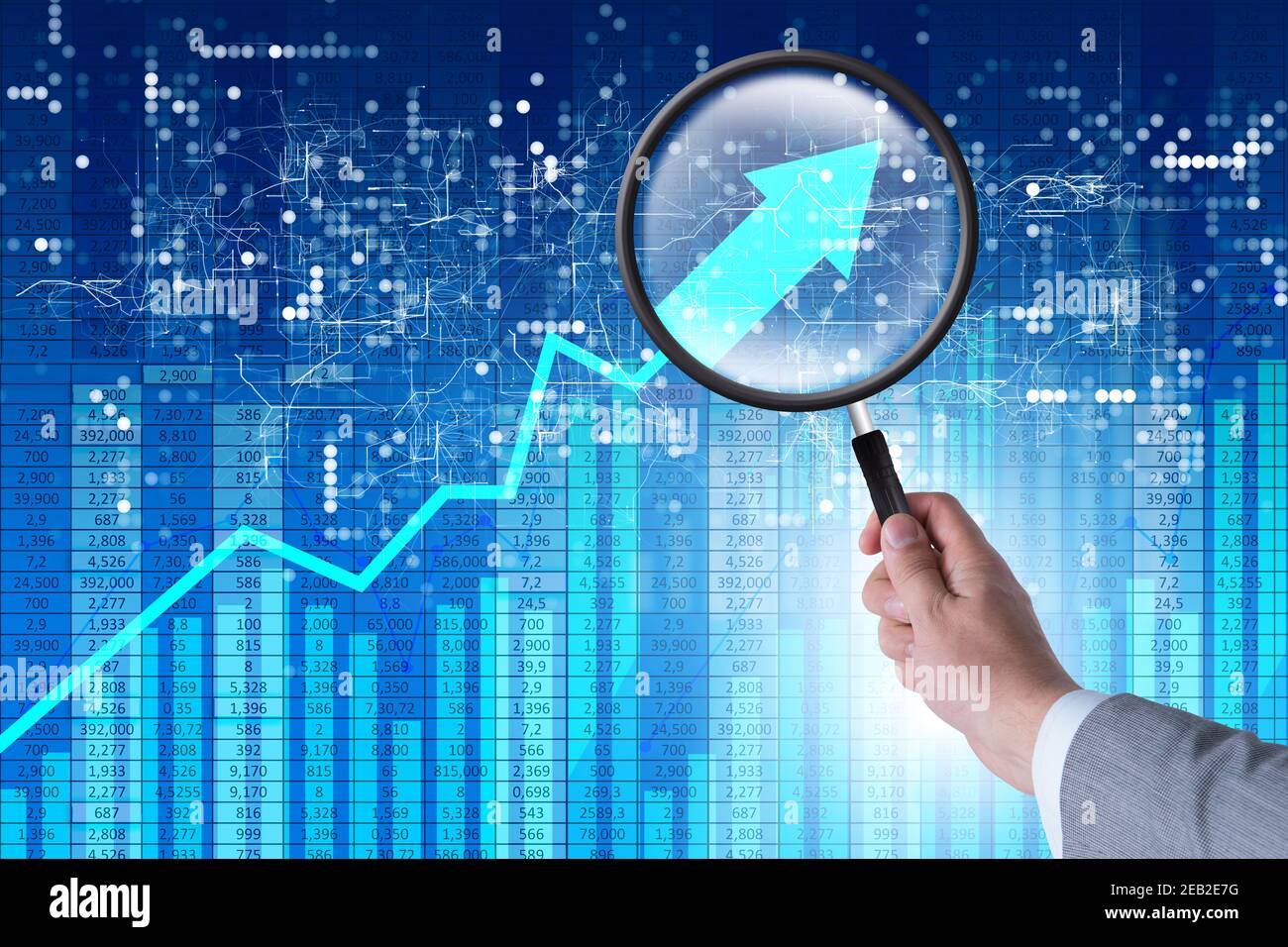 Concept of the economic growth with chart and magnifying glass Stock ...