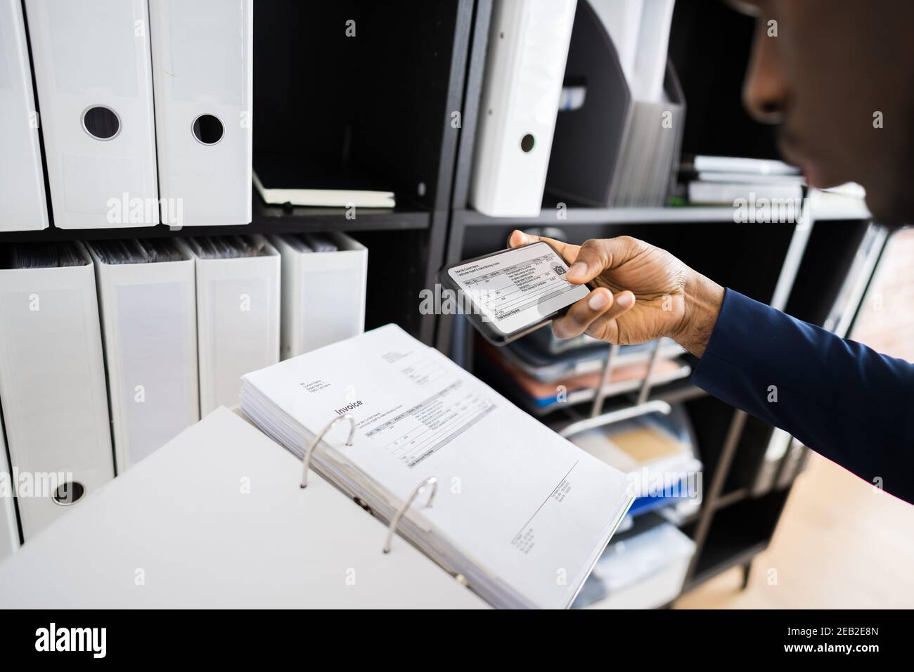 Stealing Trade Secret. Taking Photo Using Phone Stock Photo - Alamy