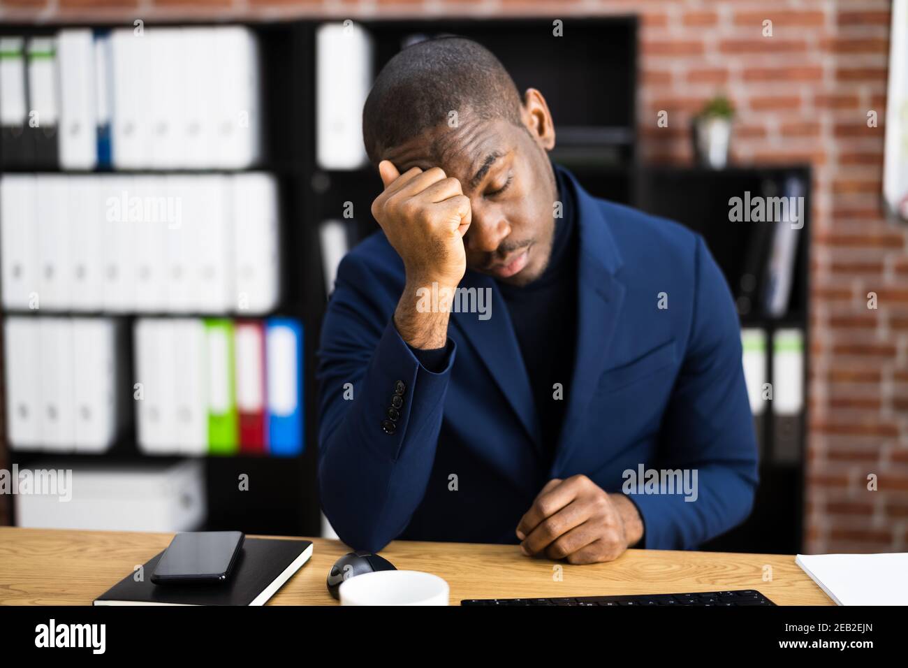 Lazy Bored African American Man Portrait With Headache Stock Photo - Alamy