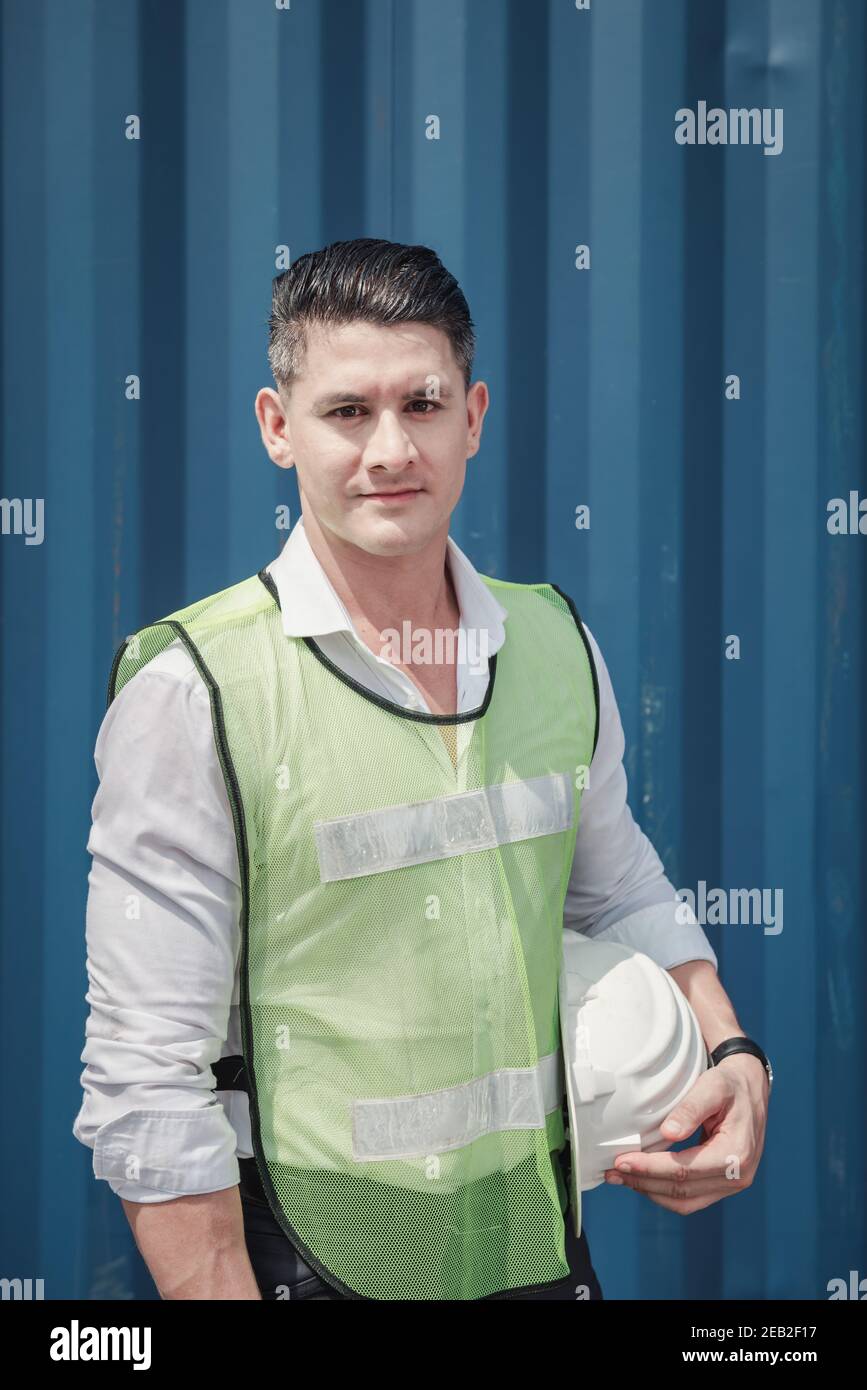 Portrait of Containers Ship Engineer Control Import/Export Standing ...